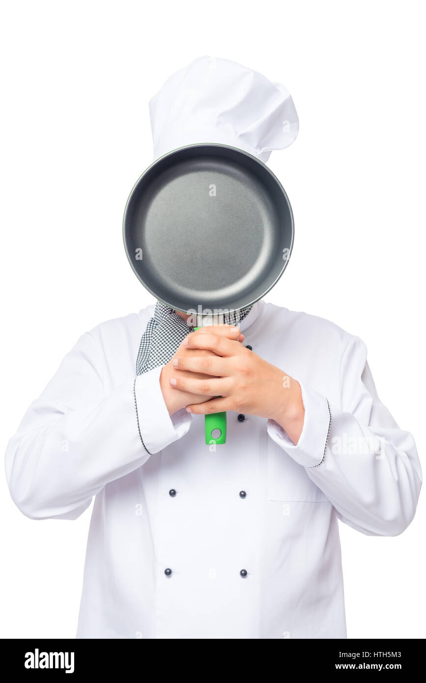 Cook covered his face black frying pan on a white background Stock ...