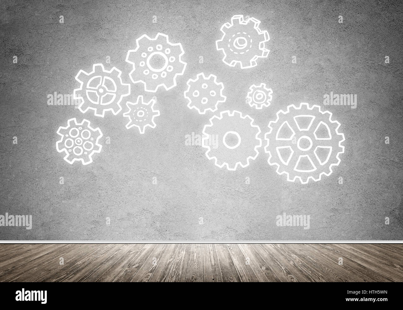 Gear hand drawn mechanism on gray wall Stock Photo - Alamy
