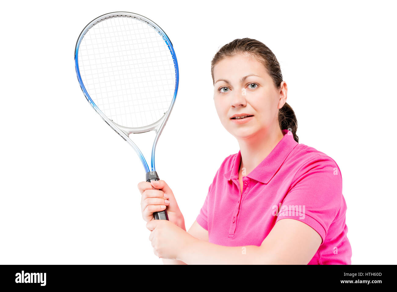 Horizontal portrait of a concentrated tennis player with a racket on a ...
