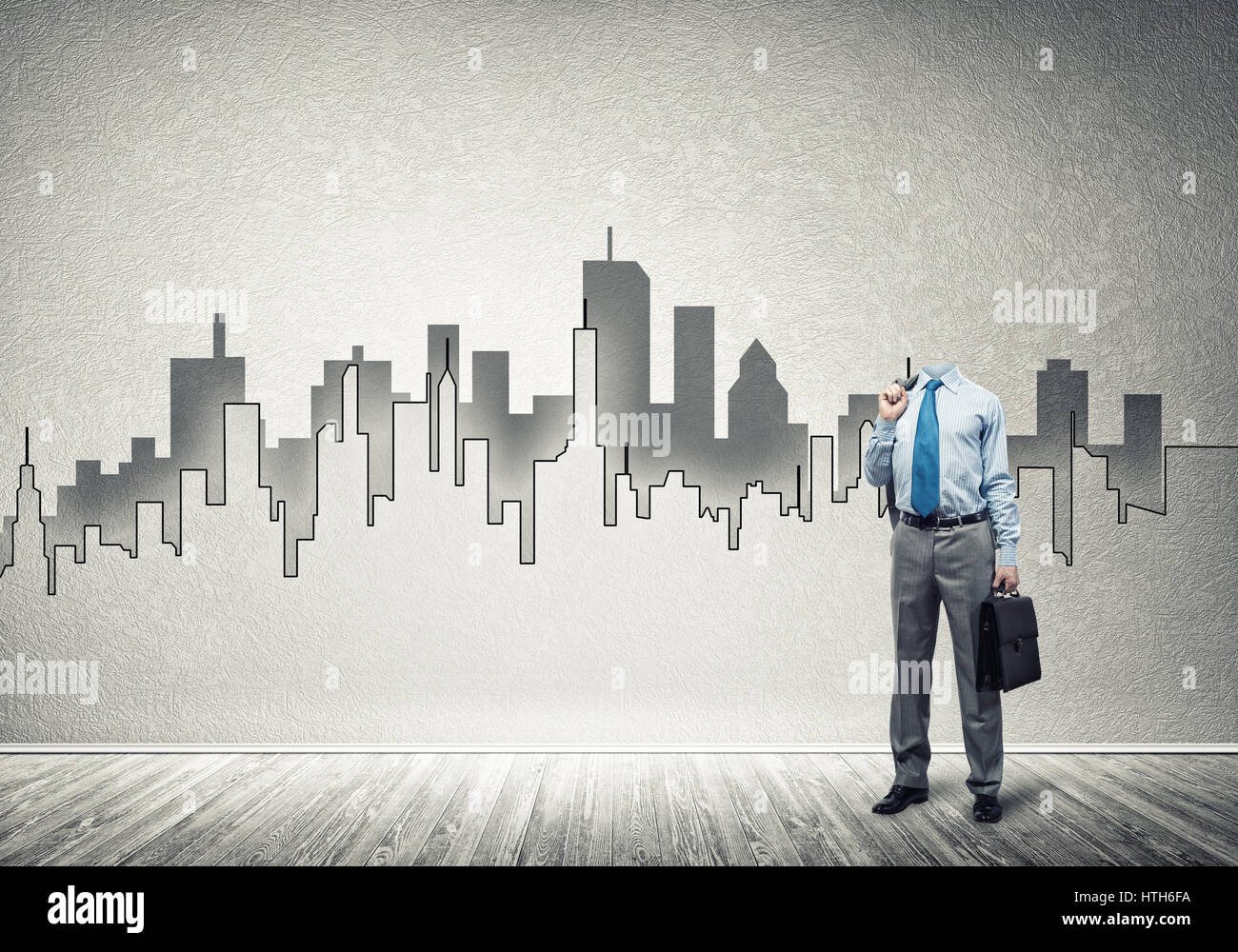 Headless engineer man with case in hand against construction background ...