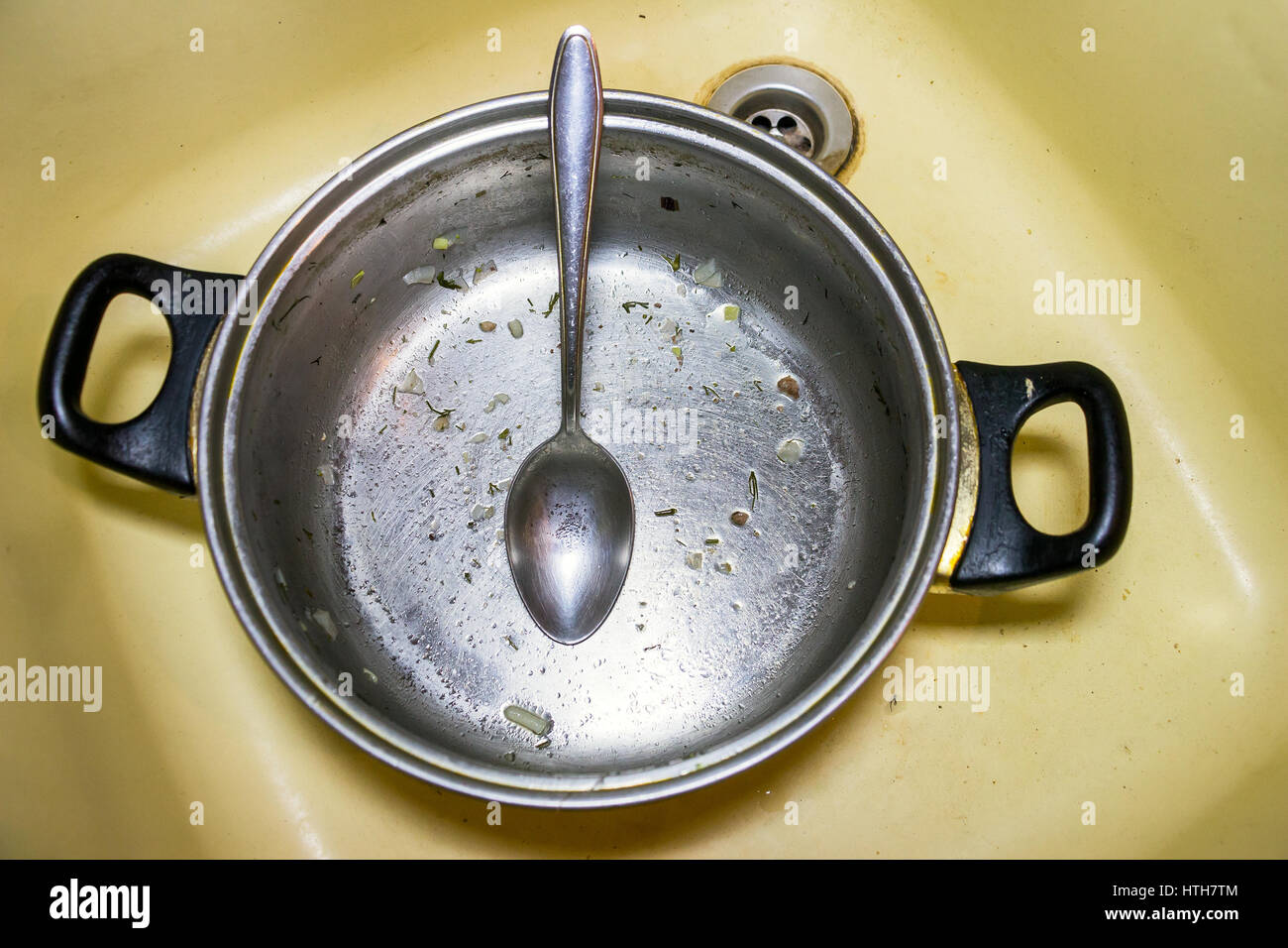 Spoon in handle of pot hi-res stock photography and images - Alamy