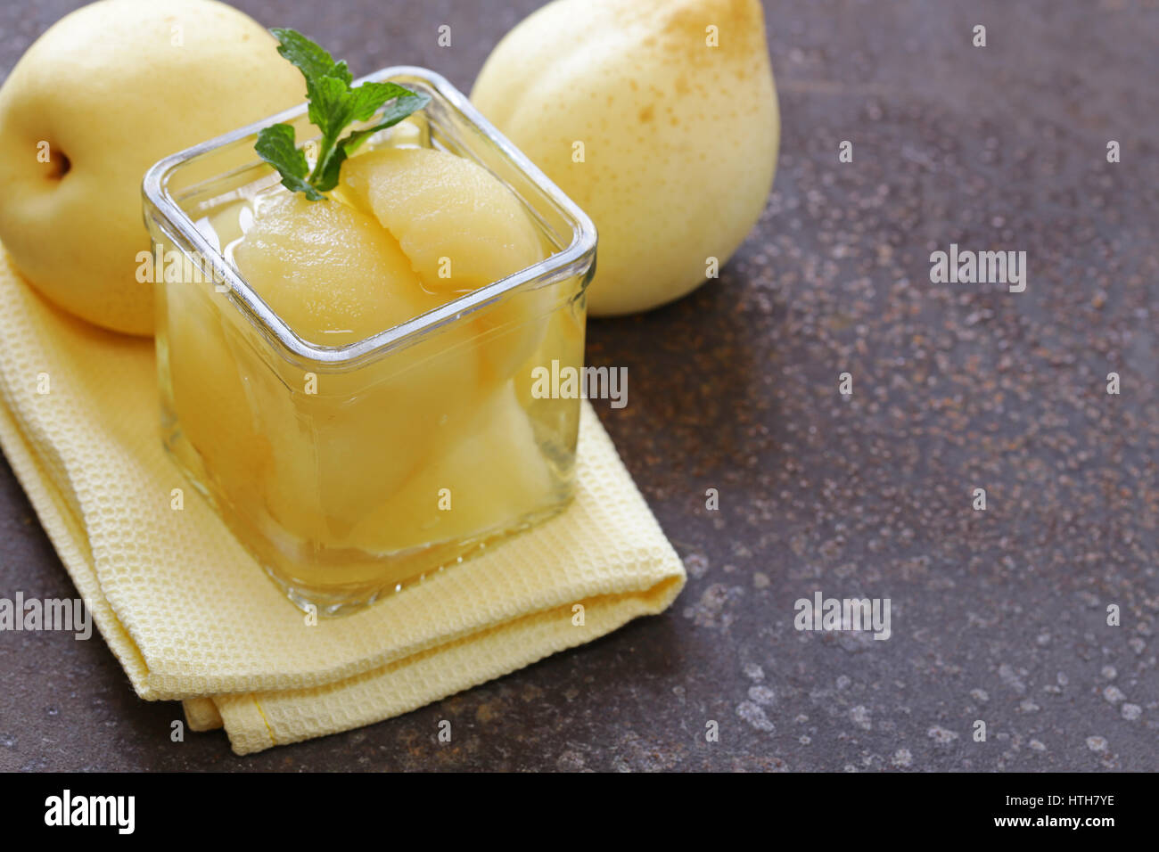 Canned fruit pears in a glass jar Stock Photo - Alamy