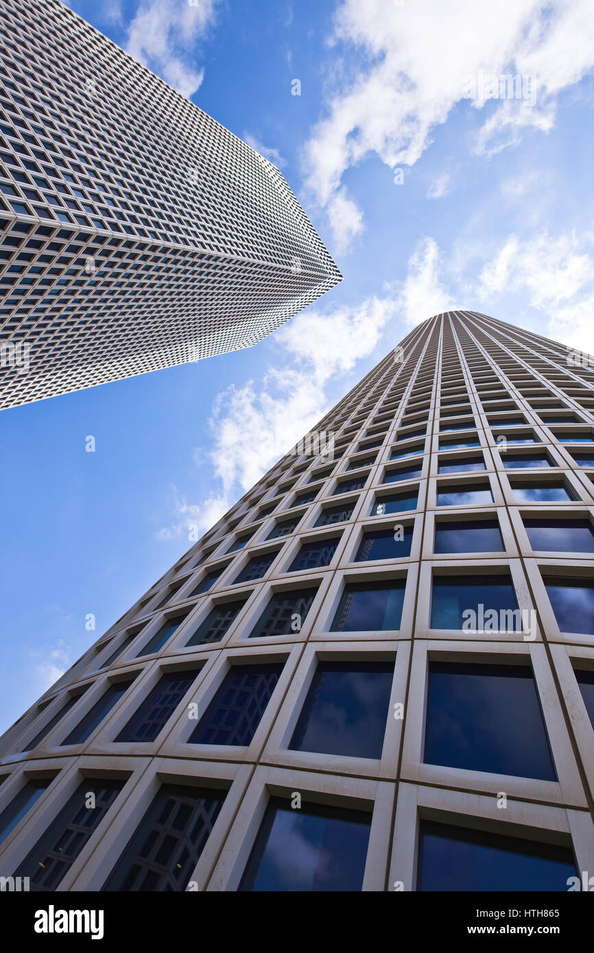 modern skyscrapers on a blue sky background Stock Photo - Alamy