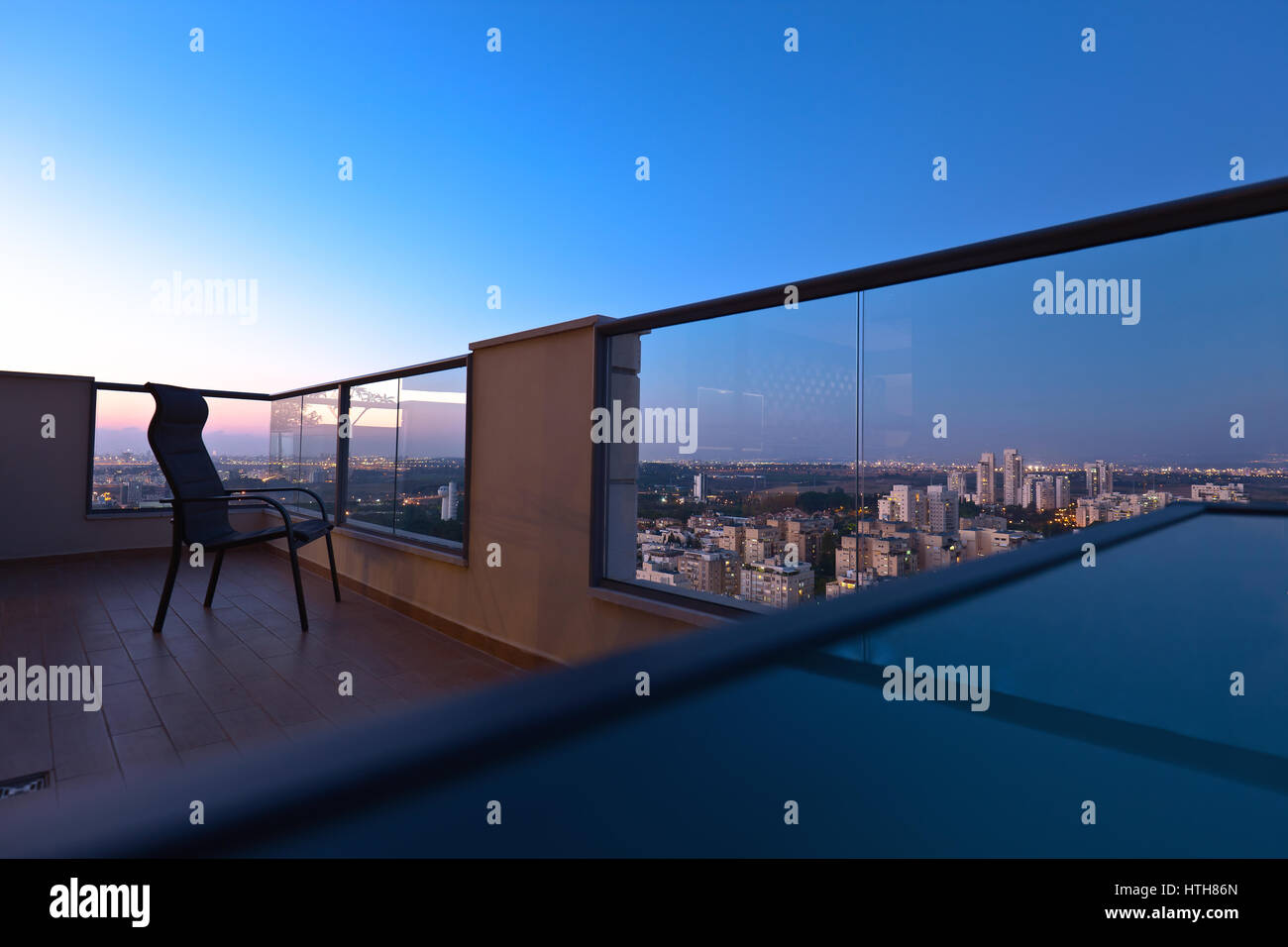 High end balcony in downtown of modern city Stock Photo - Alamy