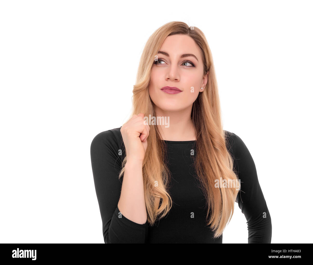 Blonde young woman looking sideways in excitement, isolated on white ...