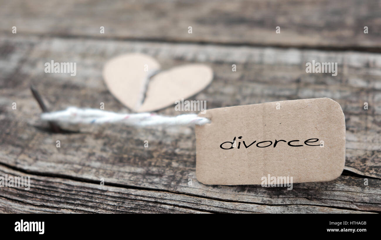 Divorce background with broken heart and message on wooden, unhappy ...