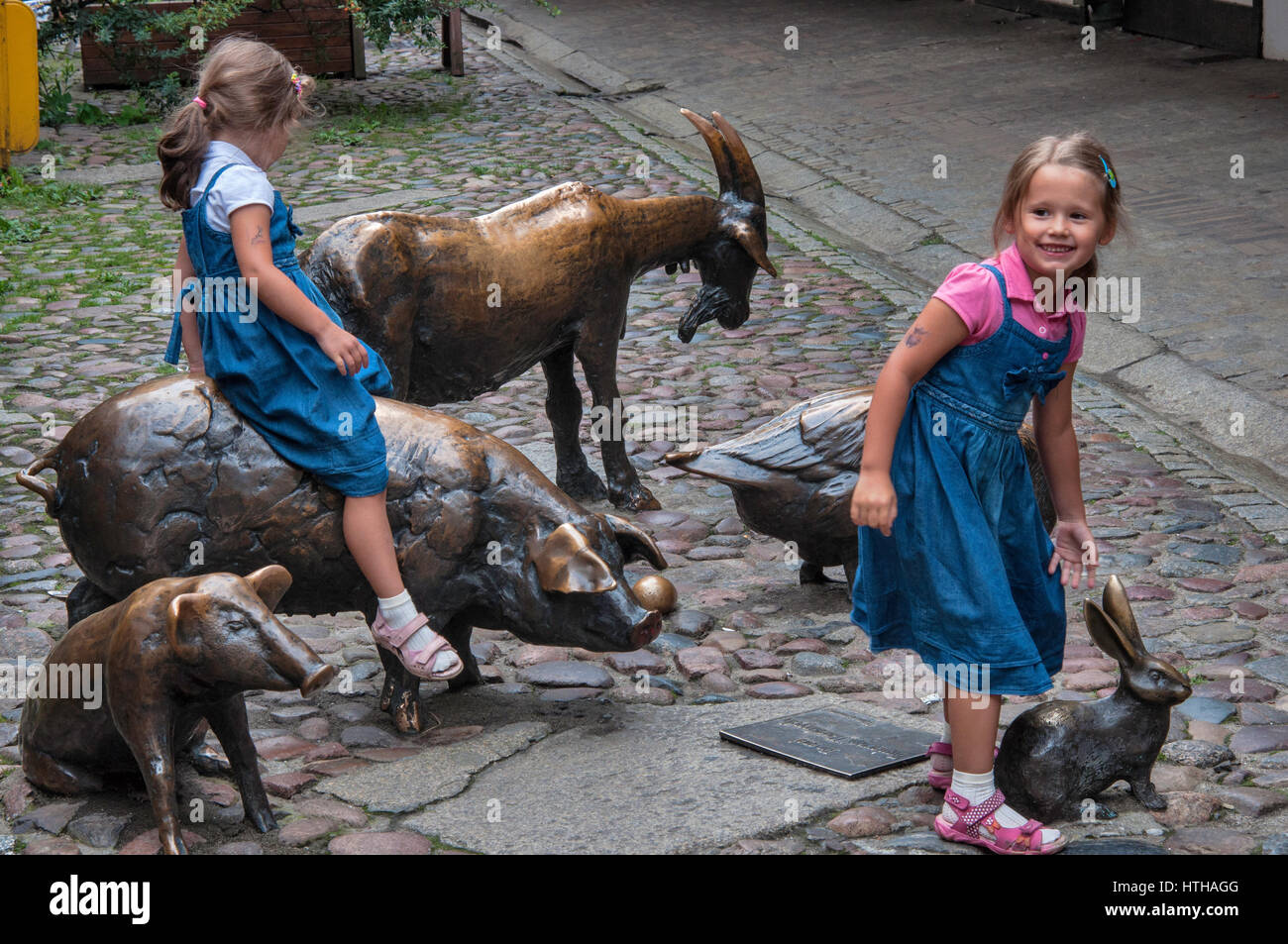 Two girls at sculptures "In Honor of Animals for Slaughter" at Jatki ...