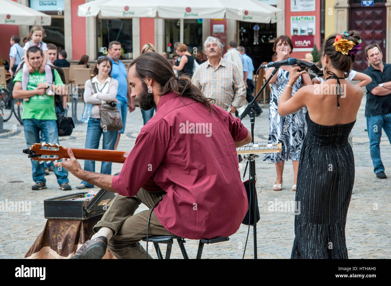 Singer and guitar player duo performing at Rynek (Market Square) in ...