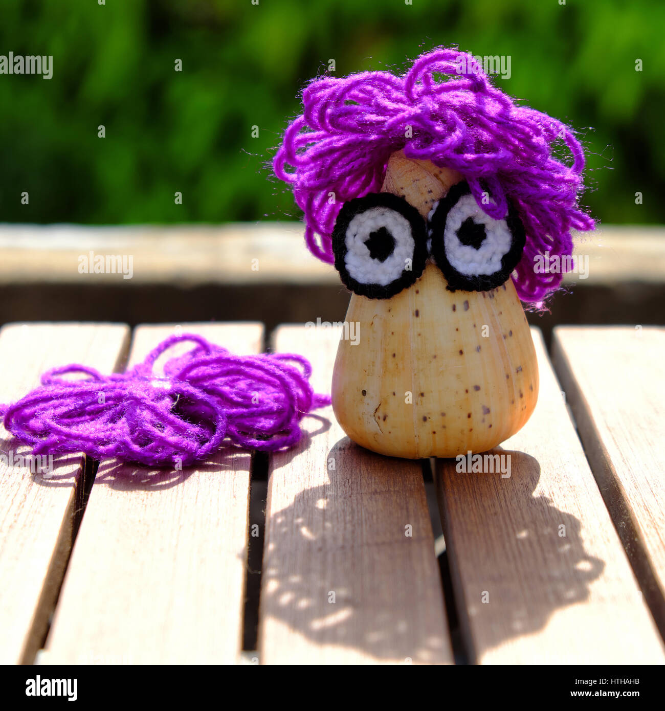 Funny creative from hobby, owl make from conch shell with knitted eyes ...