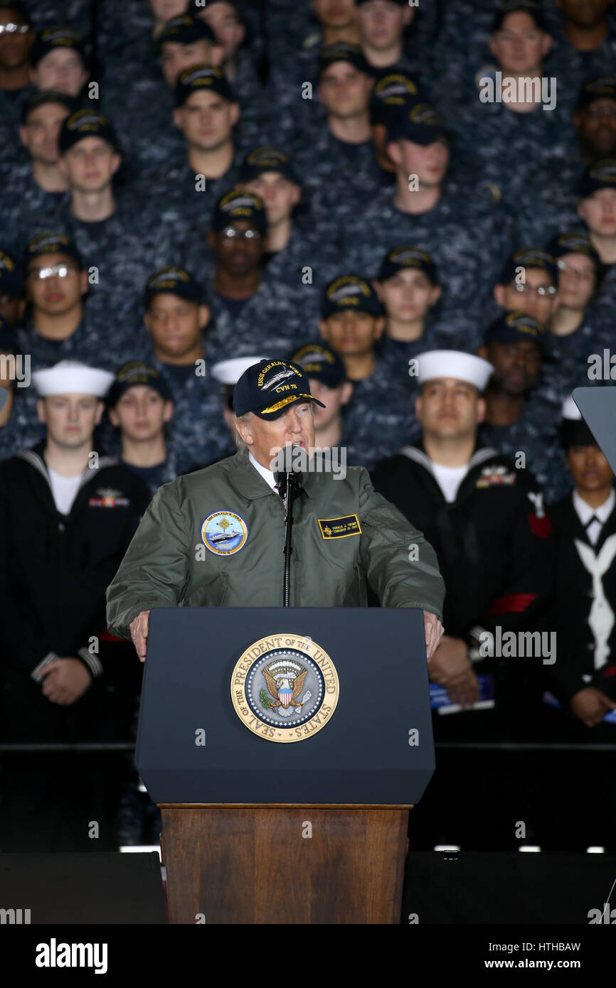 U.S. President Donald Trump speaks to U.S. sailors aboard the new ...