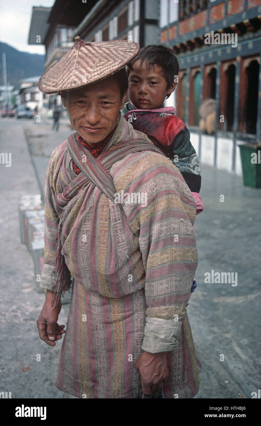 Bhutanese father and son, Thimphu, capital of Bhutan, Himalayas Stock ...