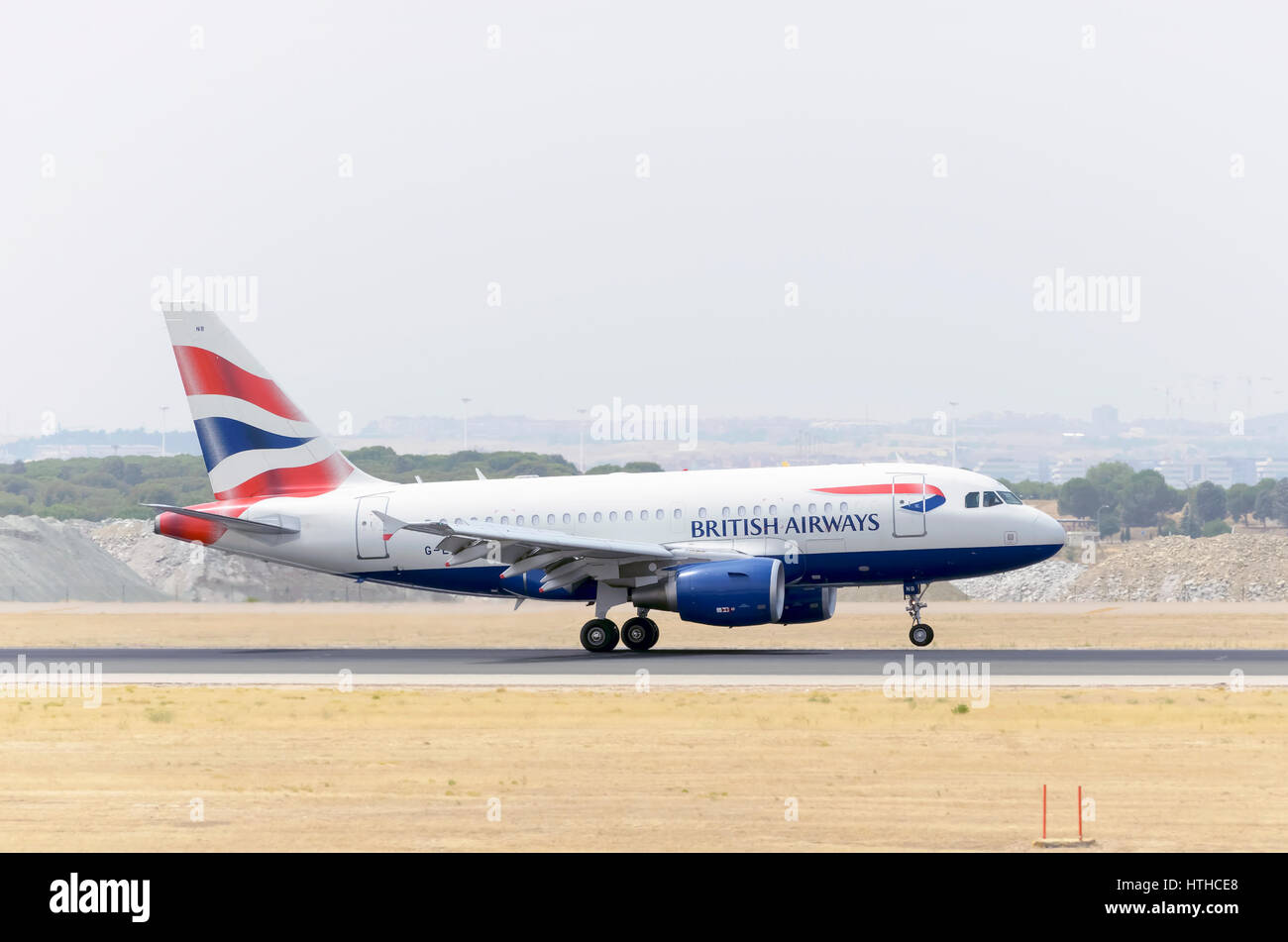 Plane Airbus A318, of British Airways airline, is landing on Madrid ...