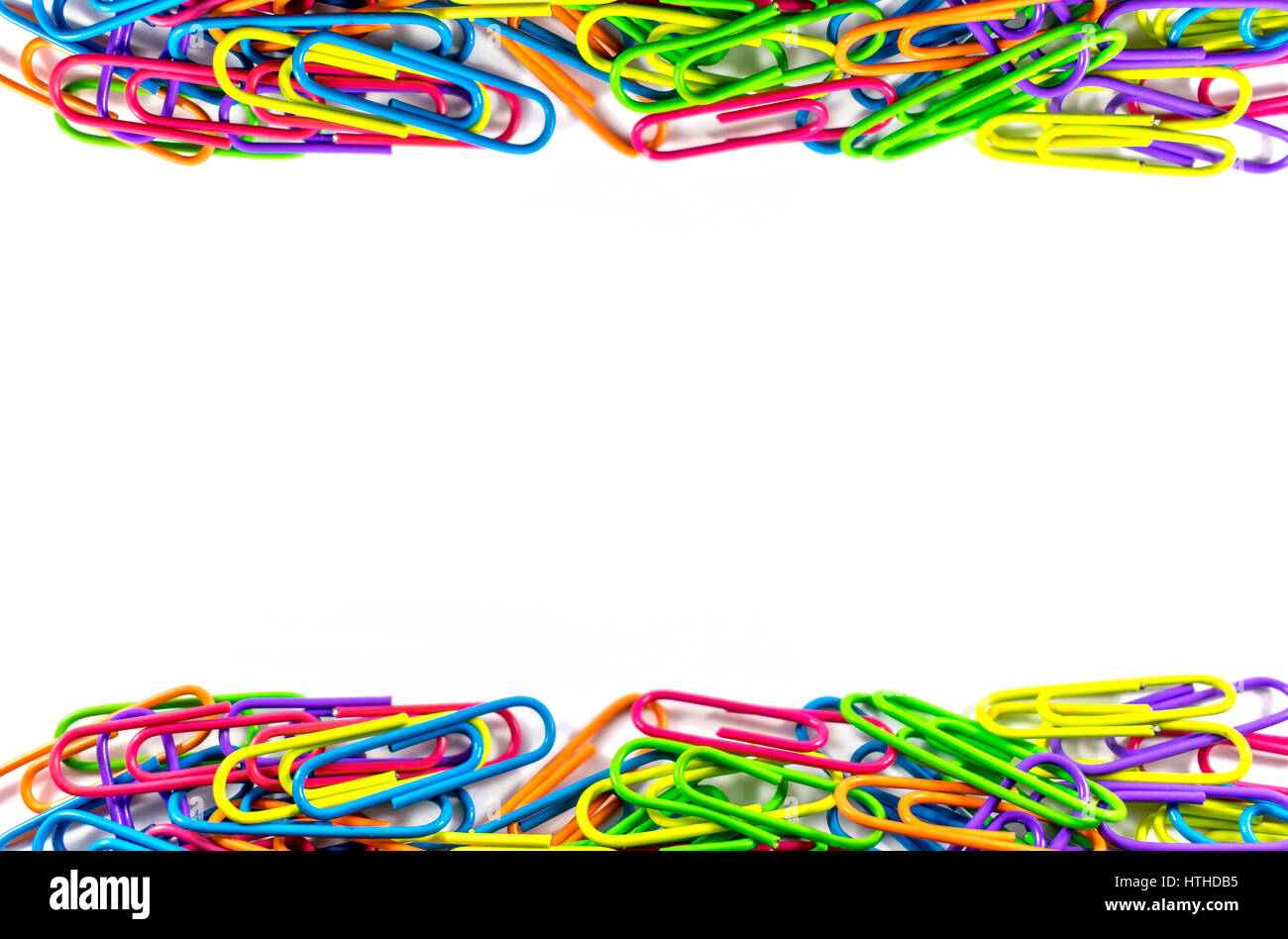 Office paper clips isolated on white background Stock Photo - Alamy