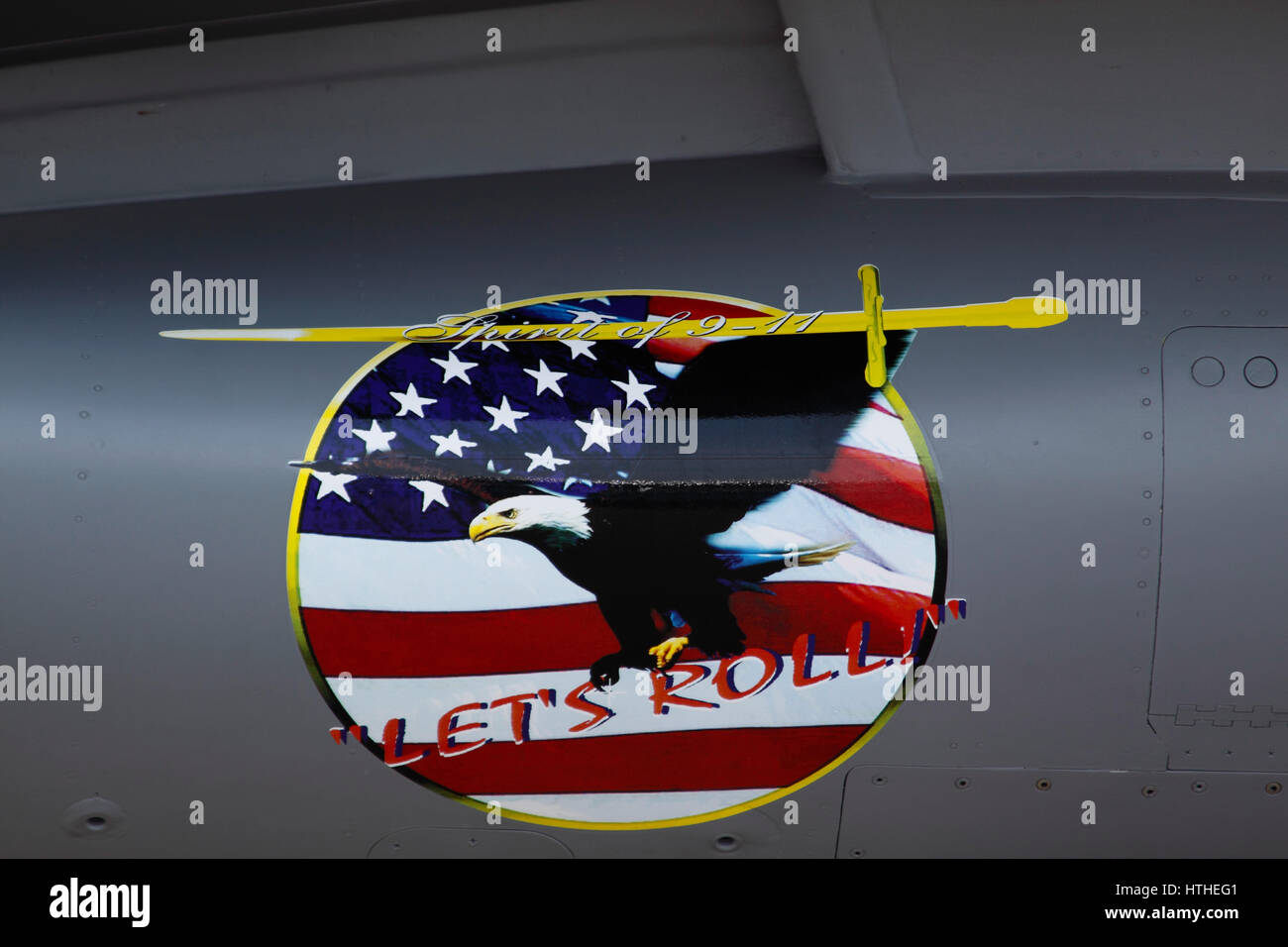 Nose art "Let's Roll" is displayed on an F-16 Falcon fighter from the ...