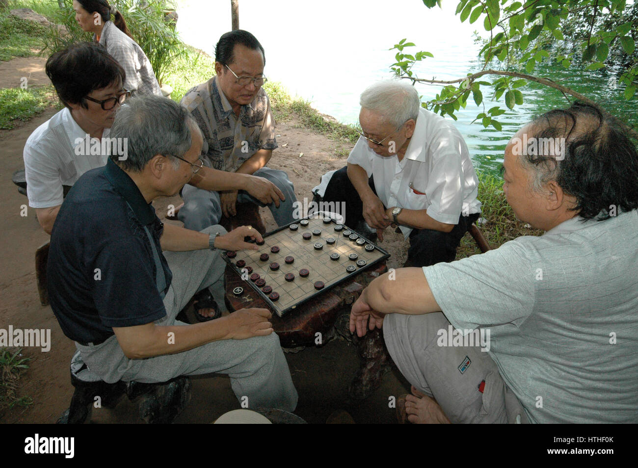 old men playing chess at sidewalk in hanoi, vietnam Stock Photo - Alamy
