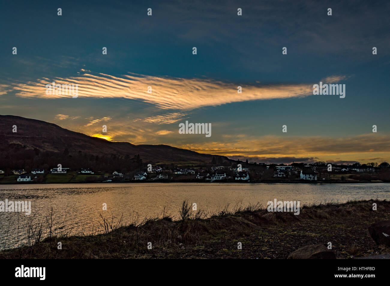 Sunset reflecting off clouds across Loch Portree, March 2017, looking ...