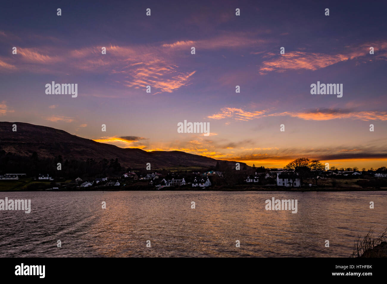 Sunset reflecting off clouds across Loch Portree, March 2017, looking ...