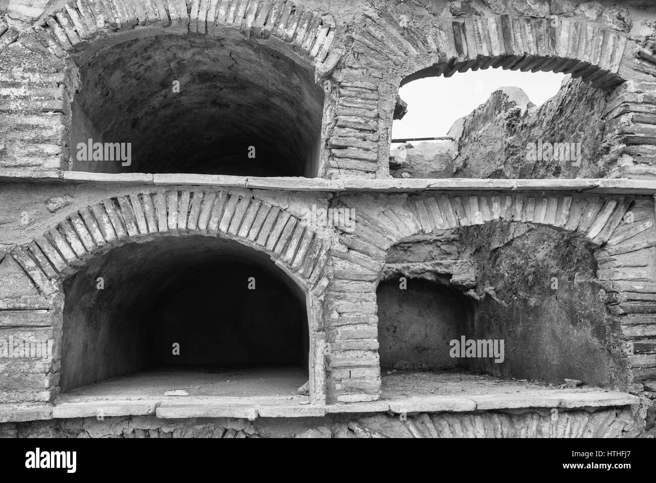 Old empty stone niches on at cemetry Stock Photo - Alamy