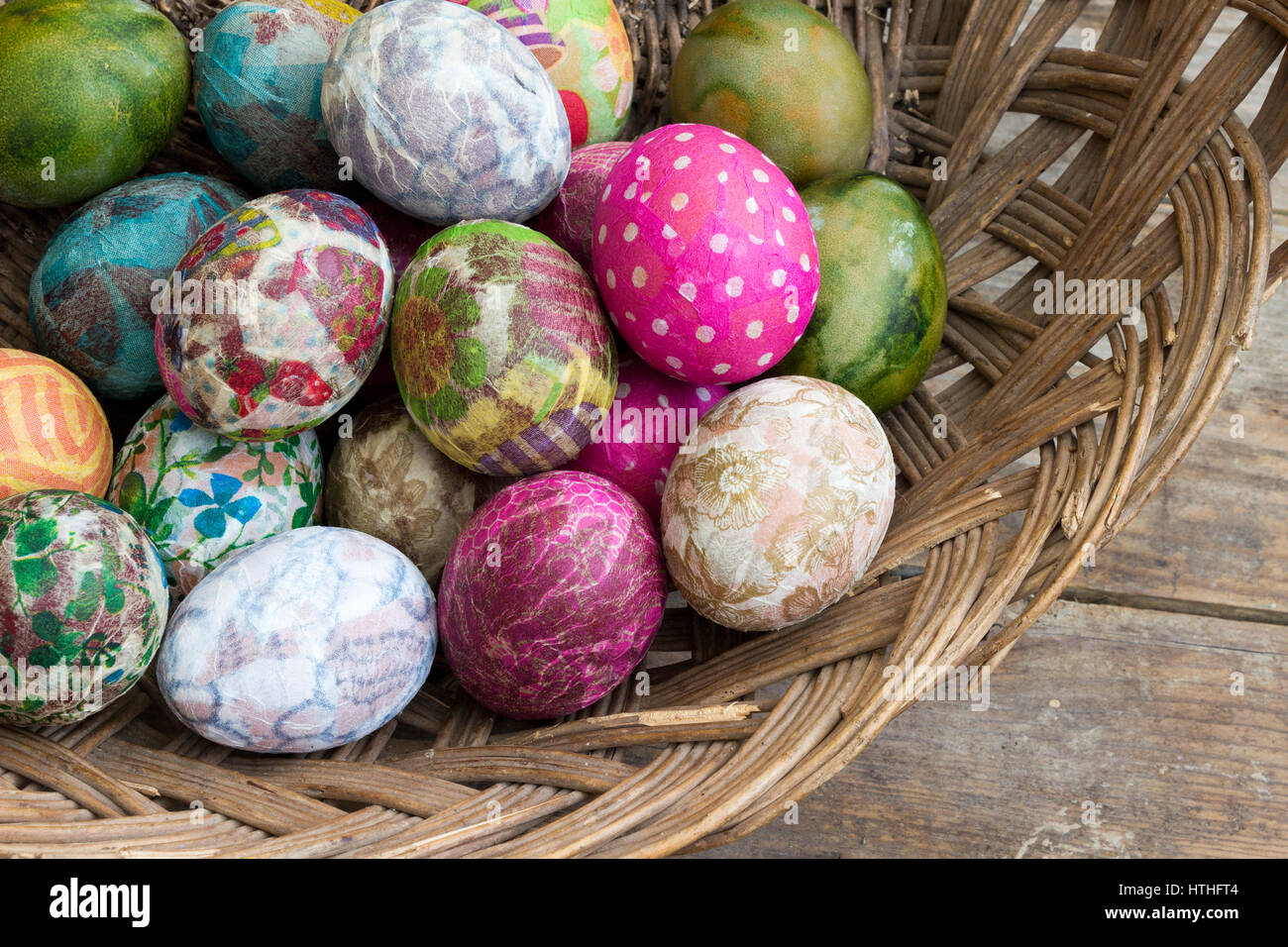 Colorful painted and decorated Easter eggs in a basket Stock Photo - Alamy