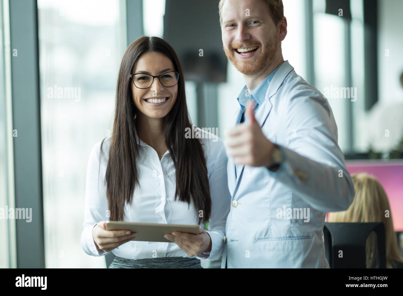 Happy and confident colleagues looking for you at expanding company ...