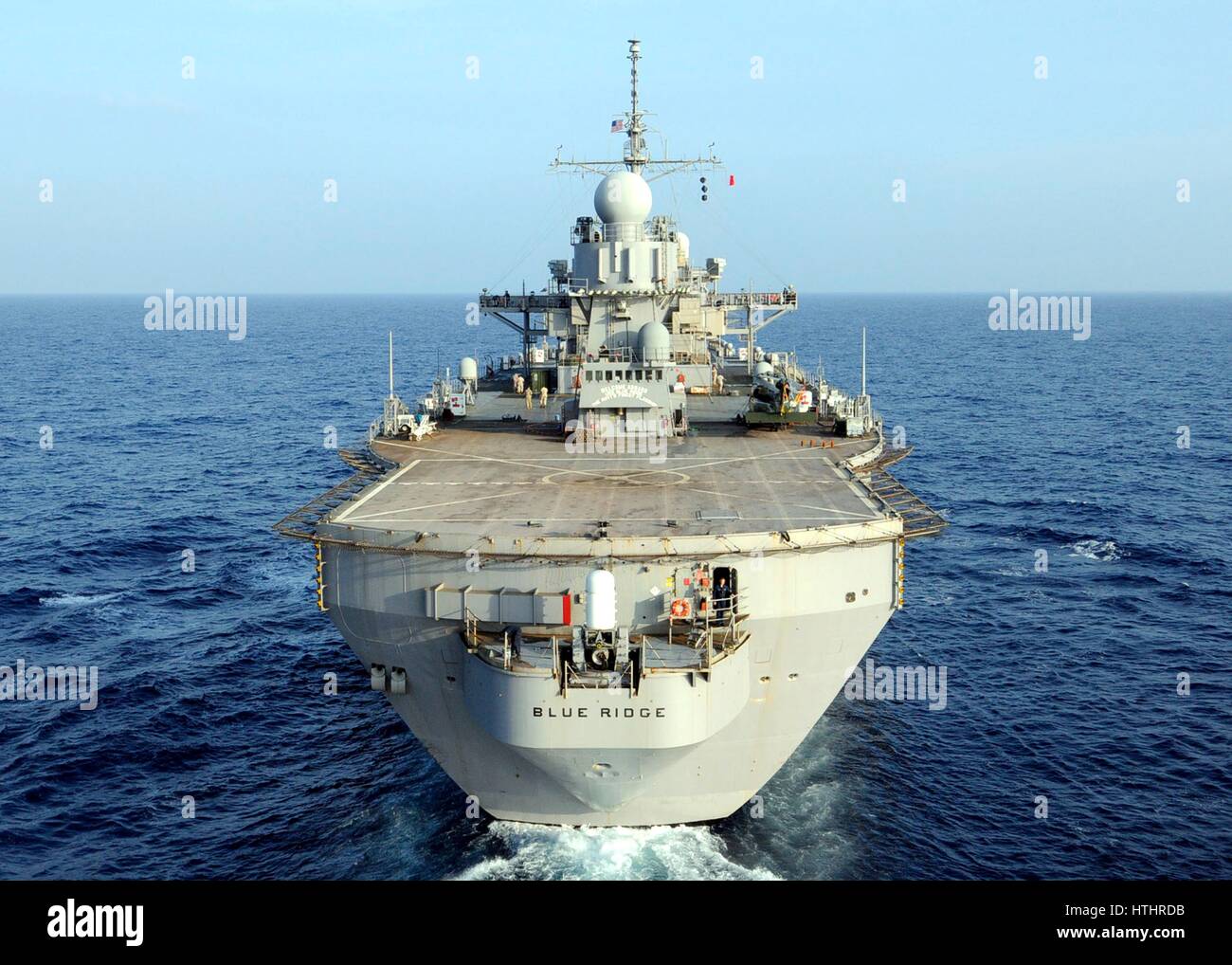 The USN Blue Ridge-class command ship USS Blue Ridge steams underway ...