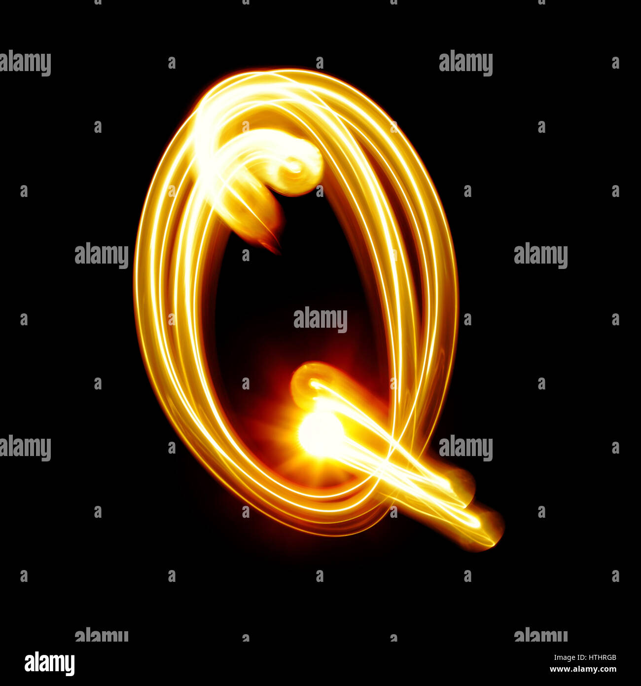 Q - Created by light alphabet over black background Stock Photo - Alamy