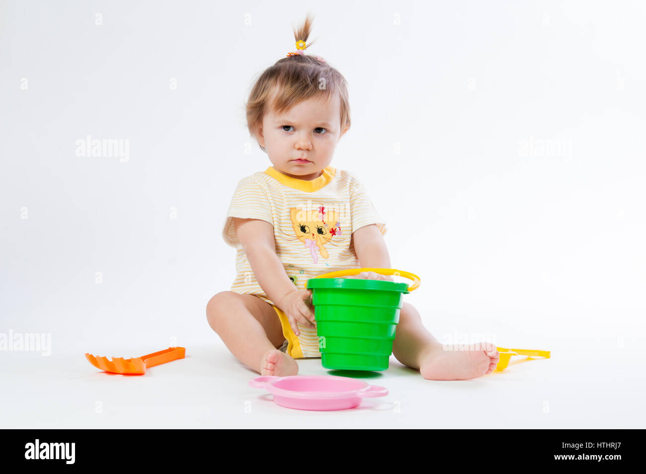 Cute baby with bucket and spade isolated on white background Stock ...