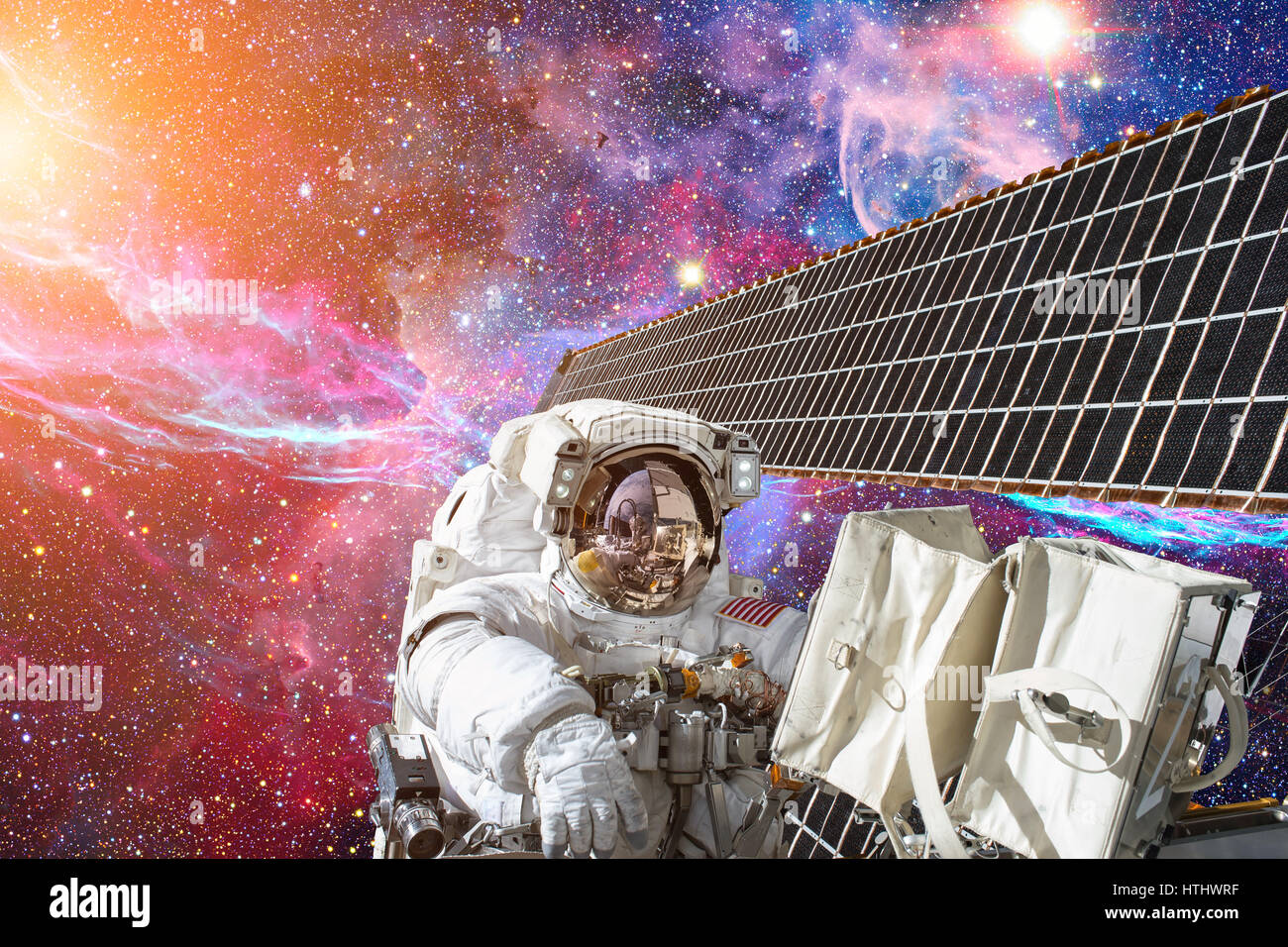 Astronaut in outer space. Spacewalk. Elements of this image furnished ...