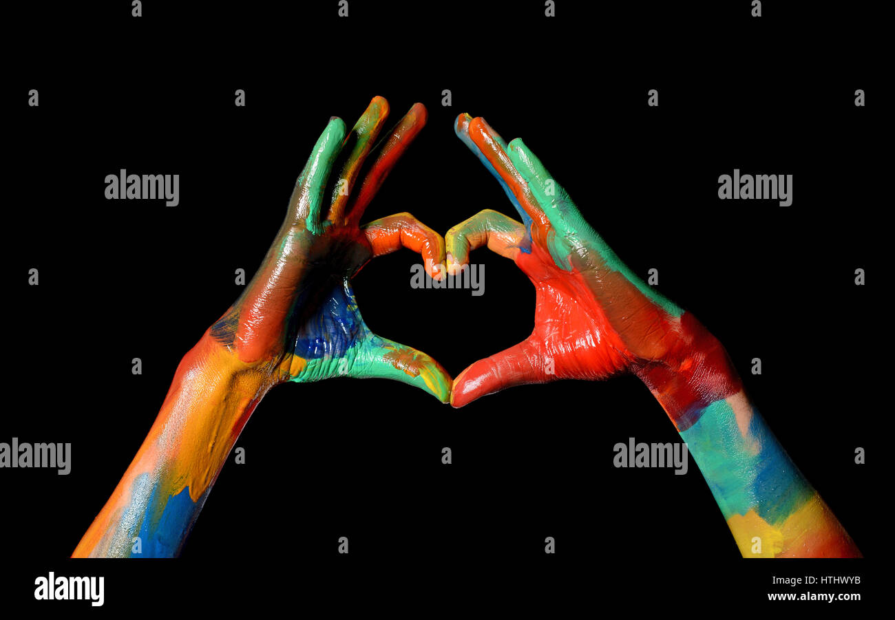 Colorful Painted Hands making heart shape love concept Stock Photo - Alamy