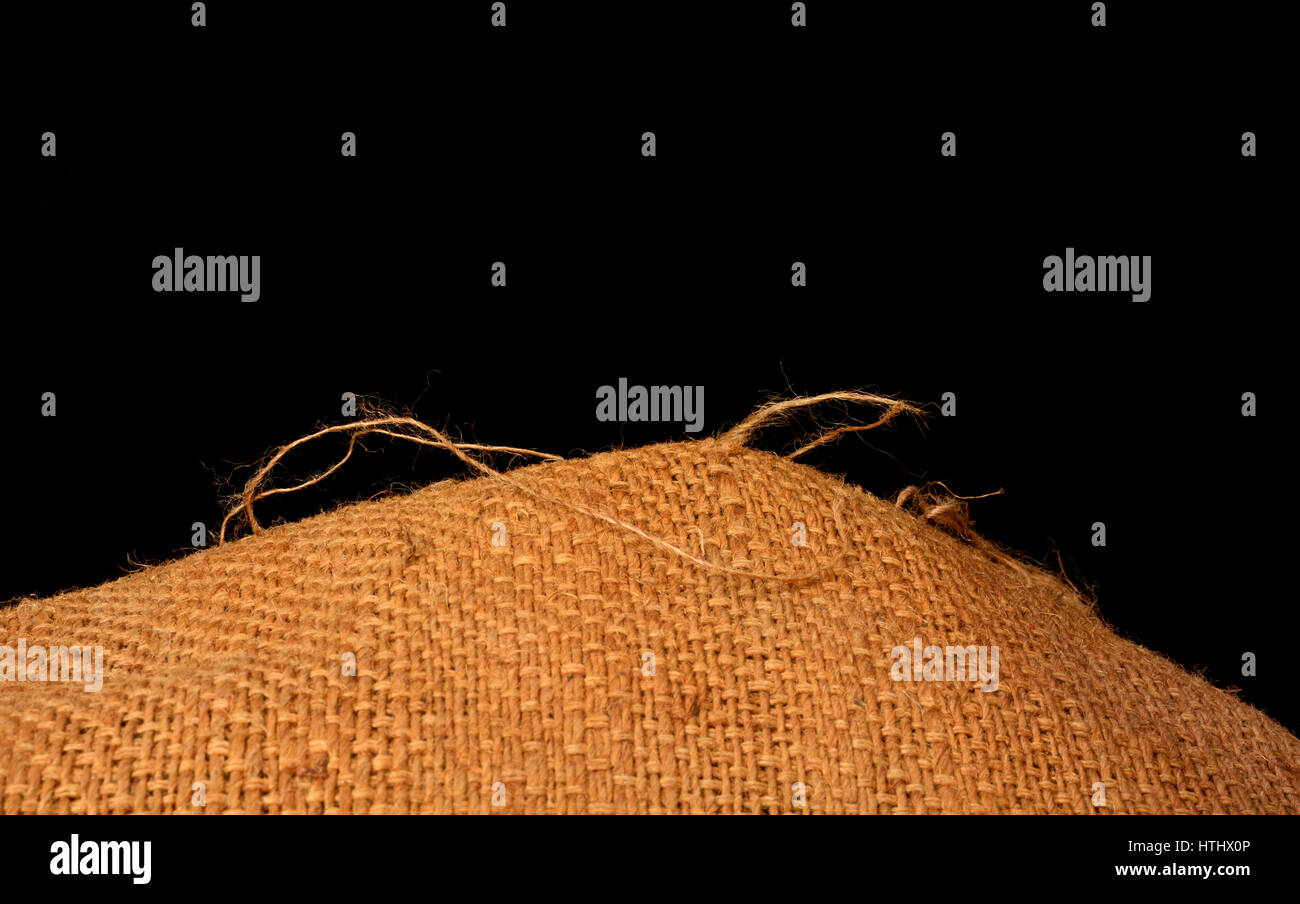 Jute Knitting Fabric close up on black background Stock Photo - Alamy
