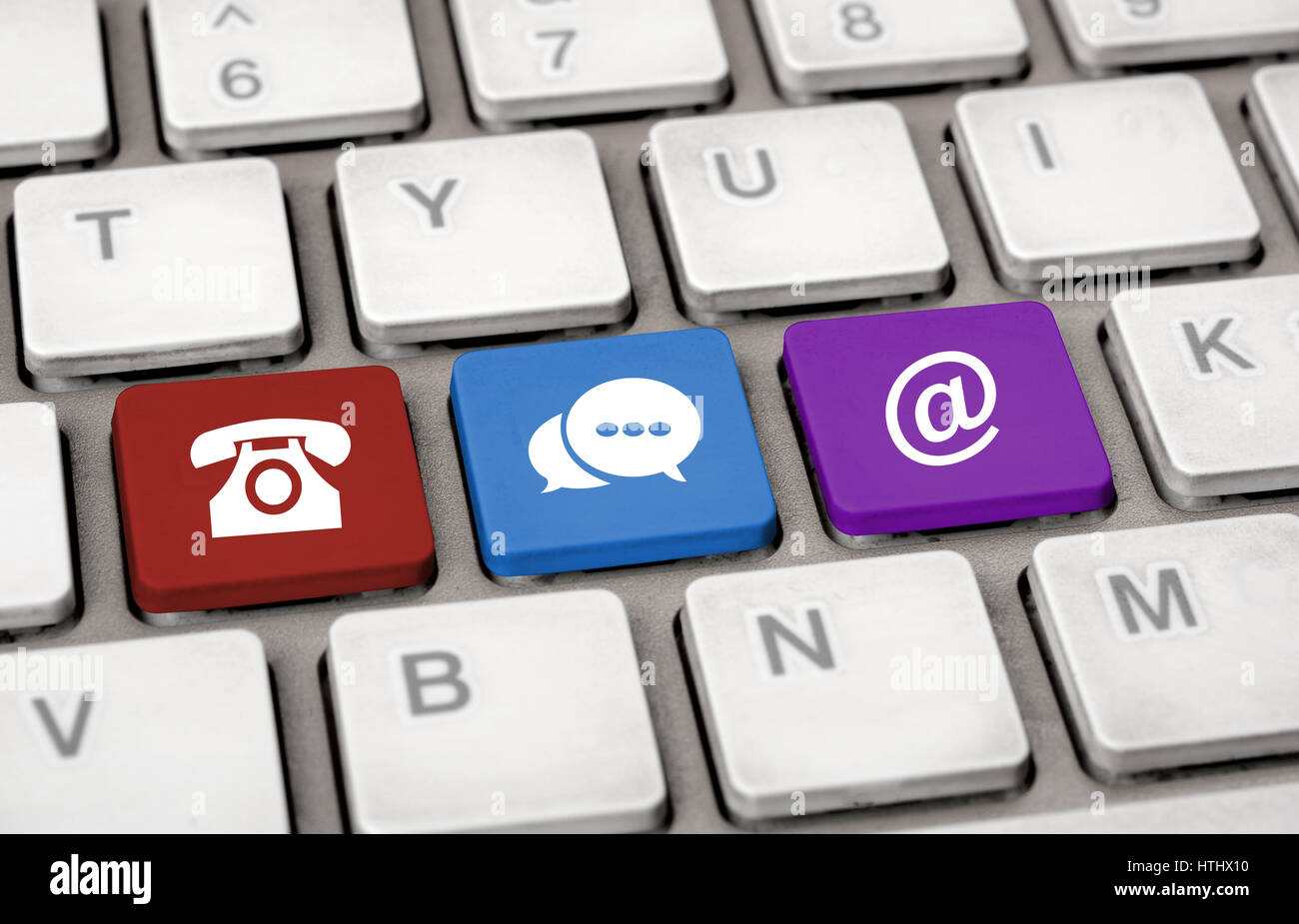 Contact Us Icons on White Keyboard communication concept Stock Photo ...