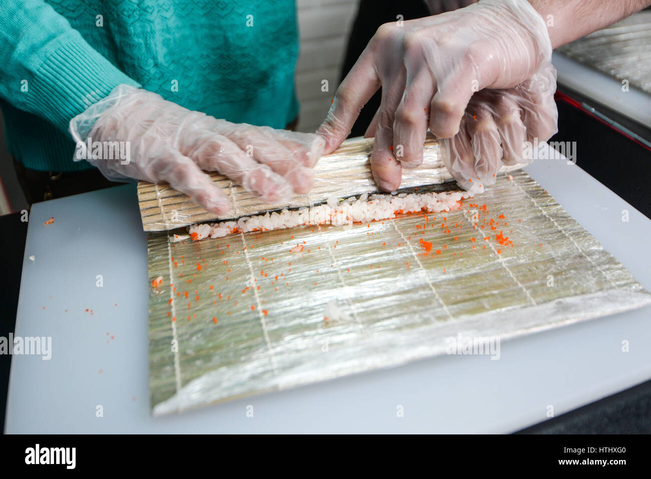 the process of making sushi rolls California Stock Photo - Alamy