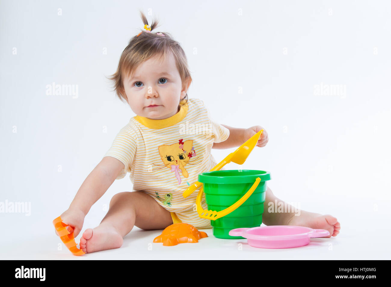 Cute baby with bucket and spade isolated on white background Stock ...