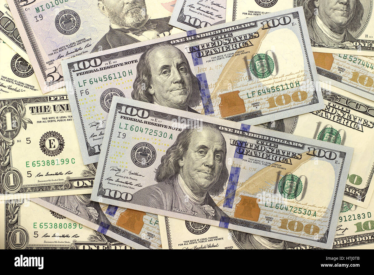 Abstract dollar bills of different denominations background Stock Photo ...