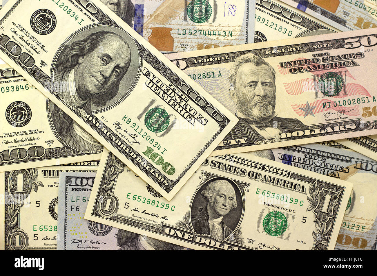Abstract dollar bills of different denominations background Stock Photo ...