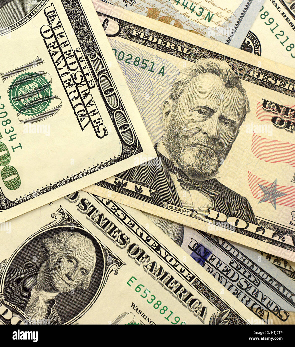 Abstract dollar bills of different denominations background Stock Photo ...