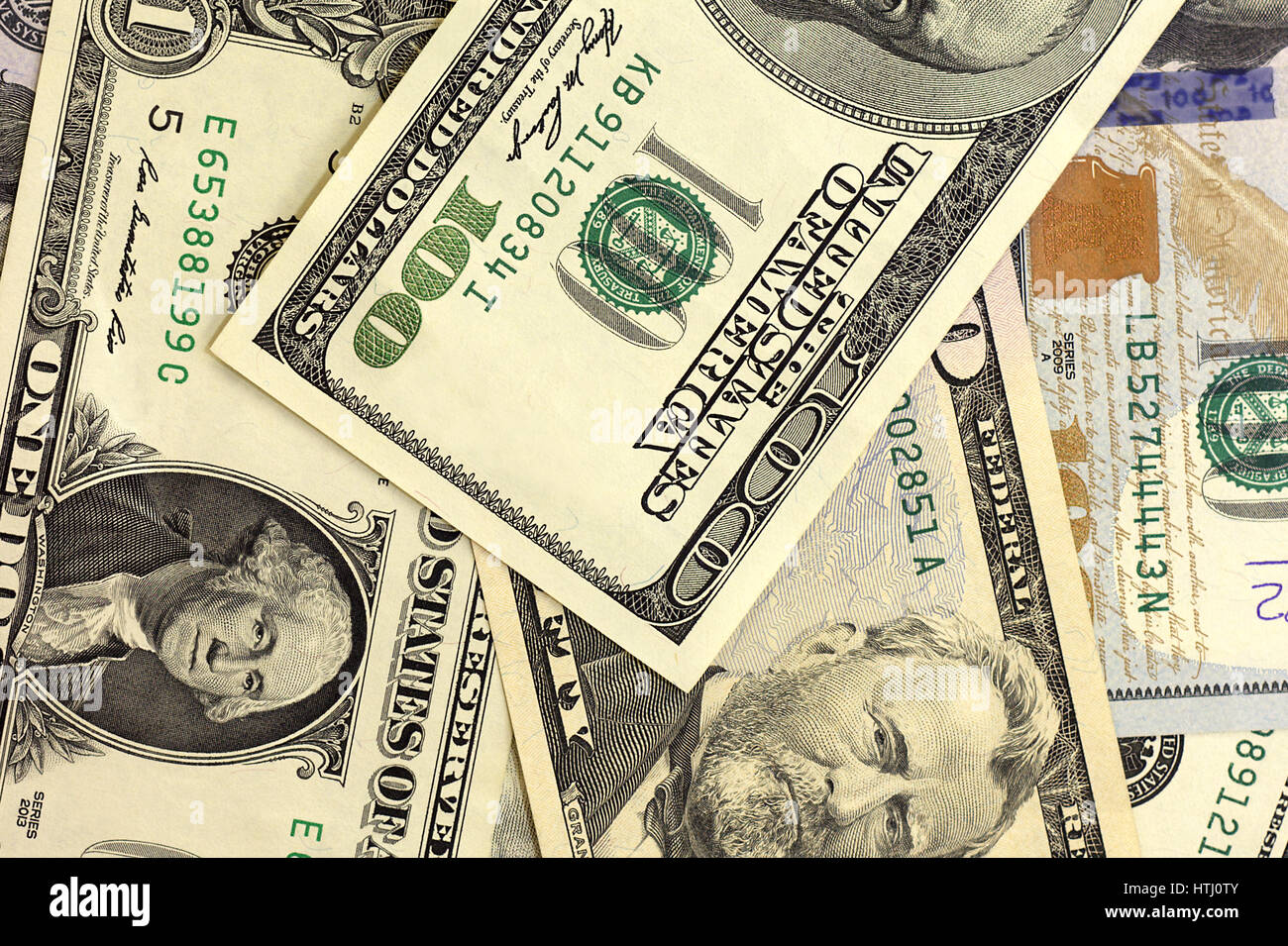 Abstract dollar bills of different denominations background Stock Photo ...
