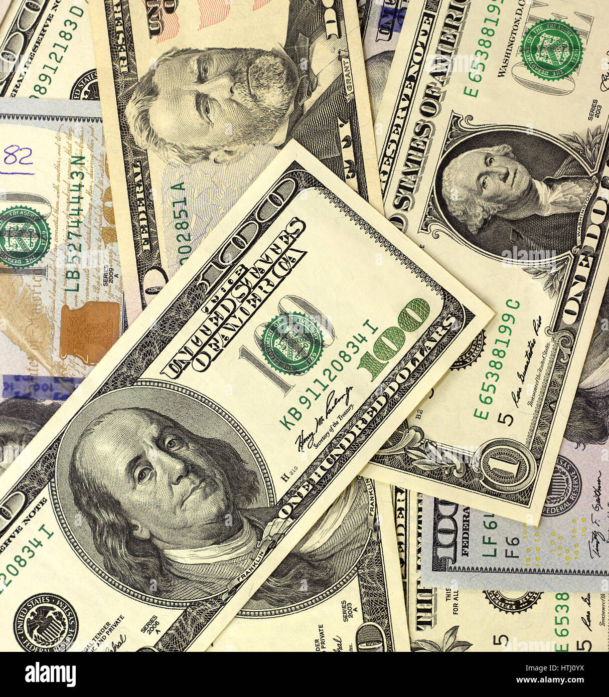 Abstract dollar bills of different denominations background Stock Photo ...