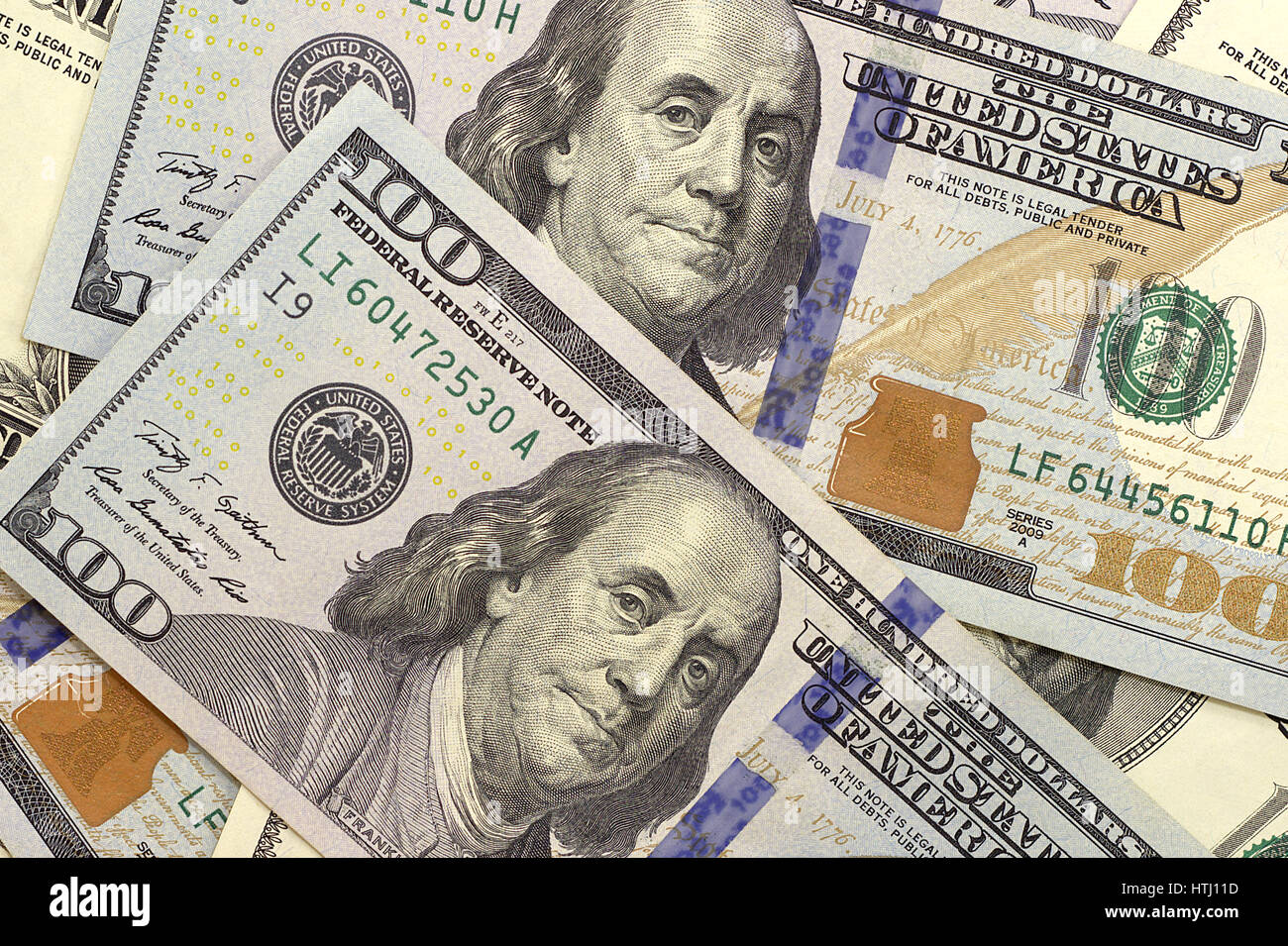 Abstract dollar bills of different denominations background Stock Photo ...