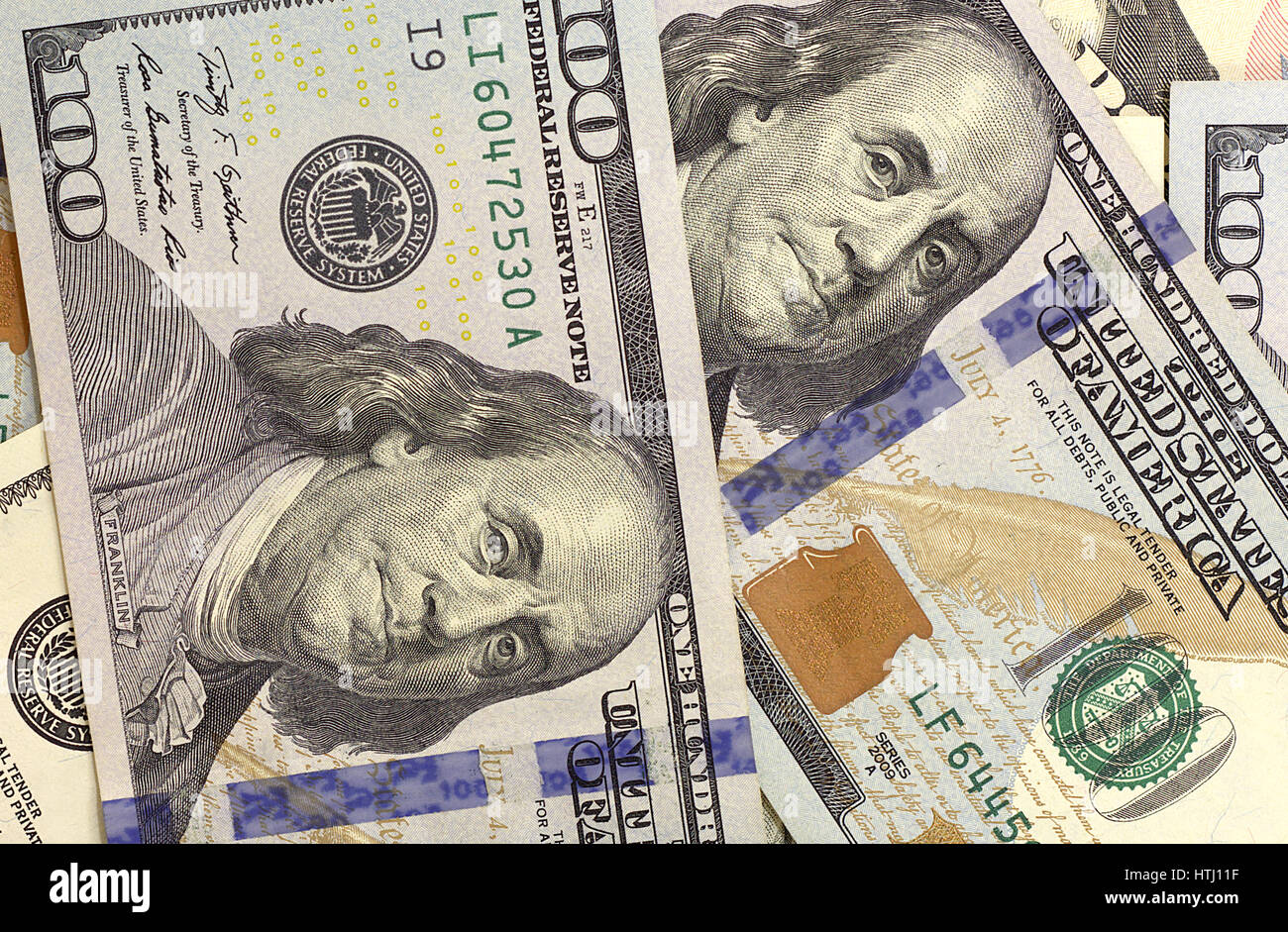 Abstract dollar bills of different denominations background Stock Photo ...