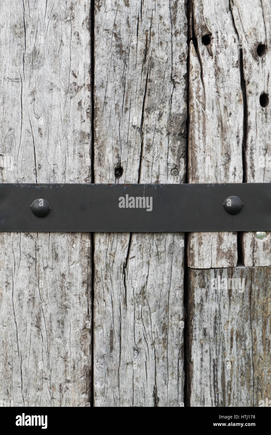 Chock wood with steel plate and black rivet connect background texture ...