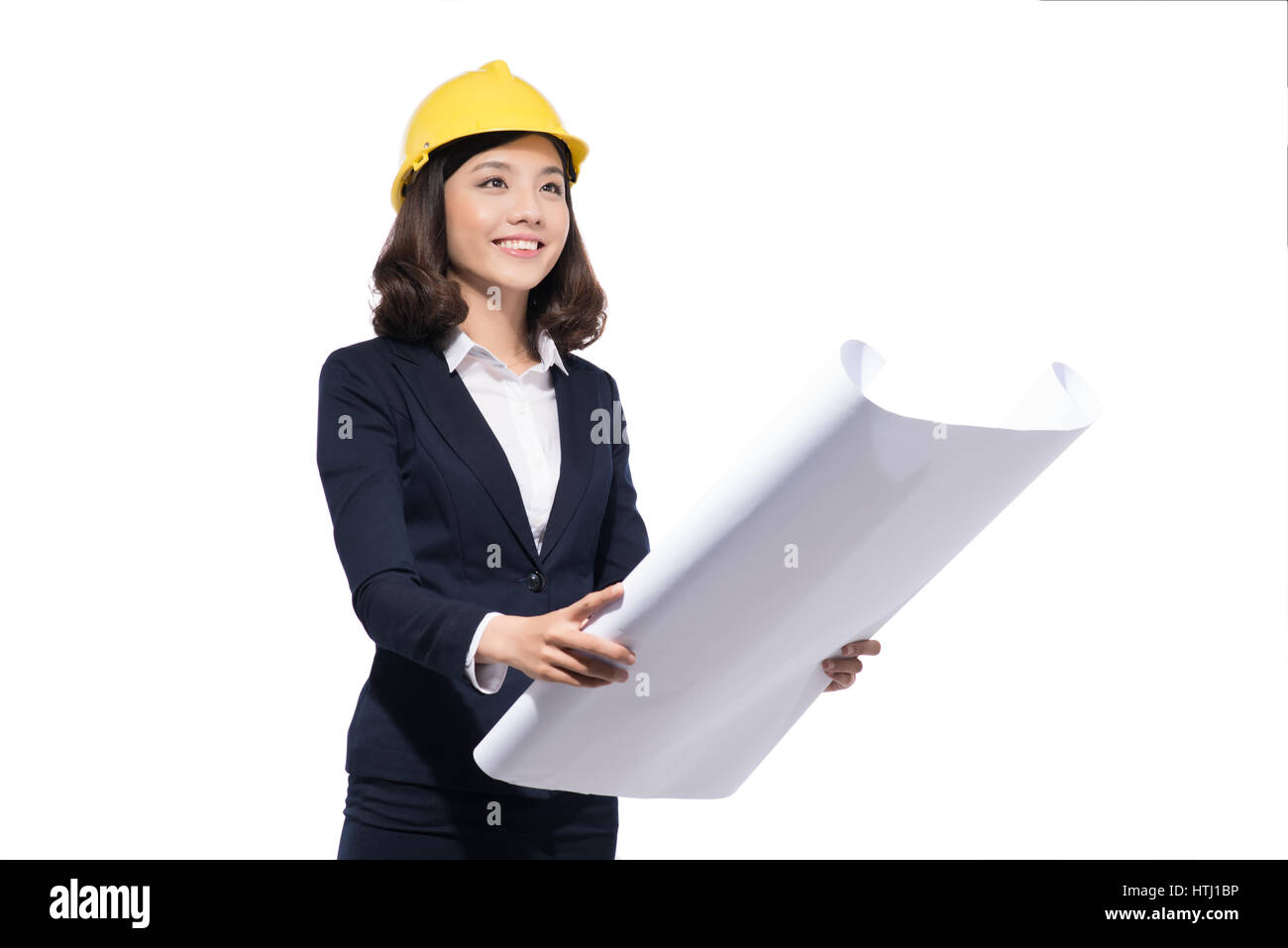 Portrait of architect student woman with blueprints protect wearing ...