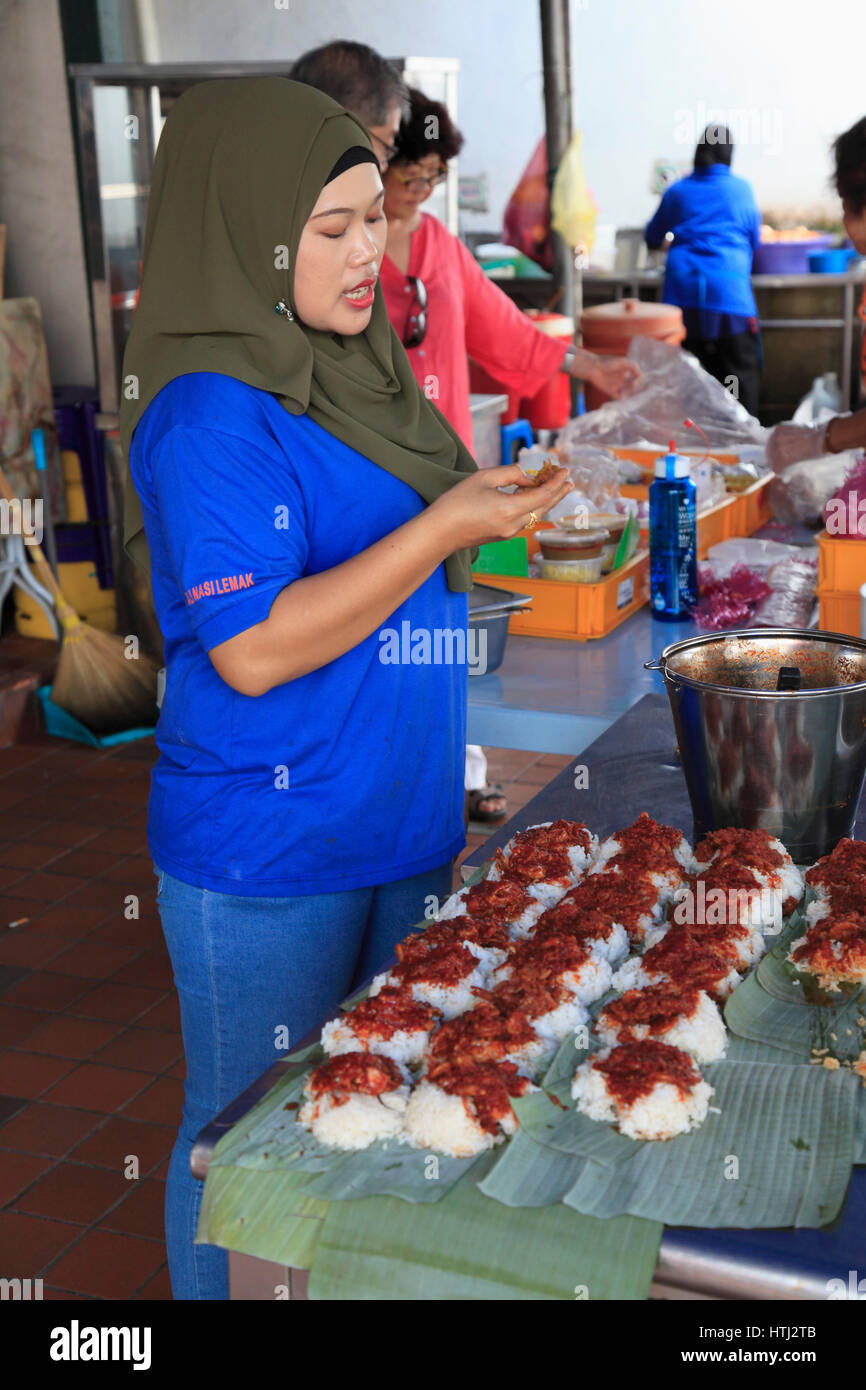 Malaysia, Penang, cook preparing food Stock Photo - Alamy