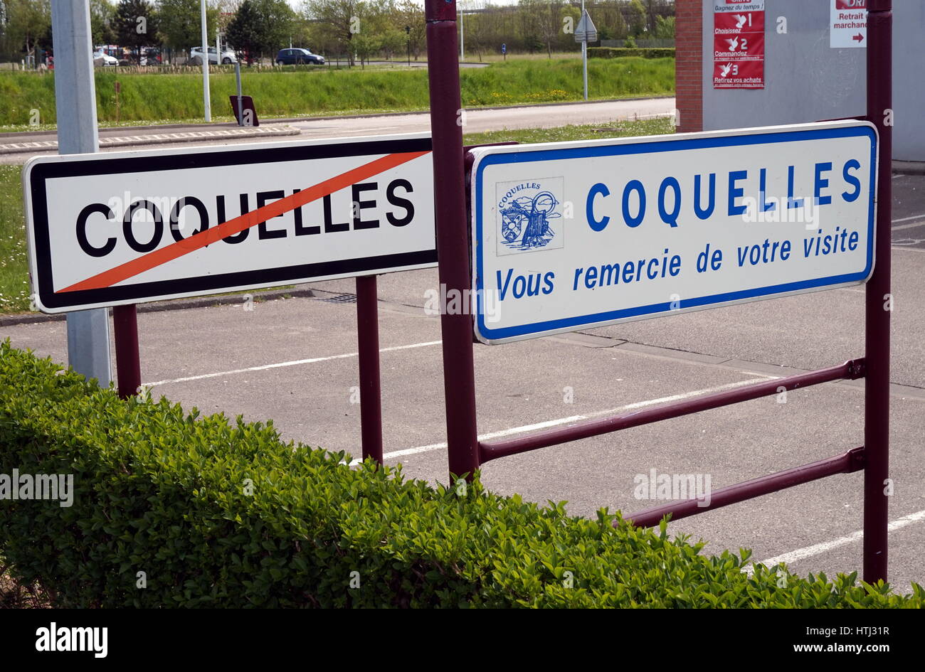 COQUELLES, PAS-DE-CALAIS, FRANCE, MAY 07 2016: Town limits signs for ...