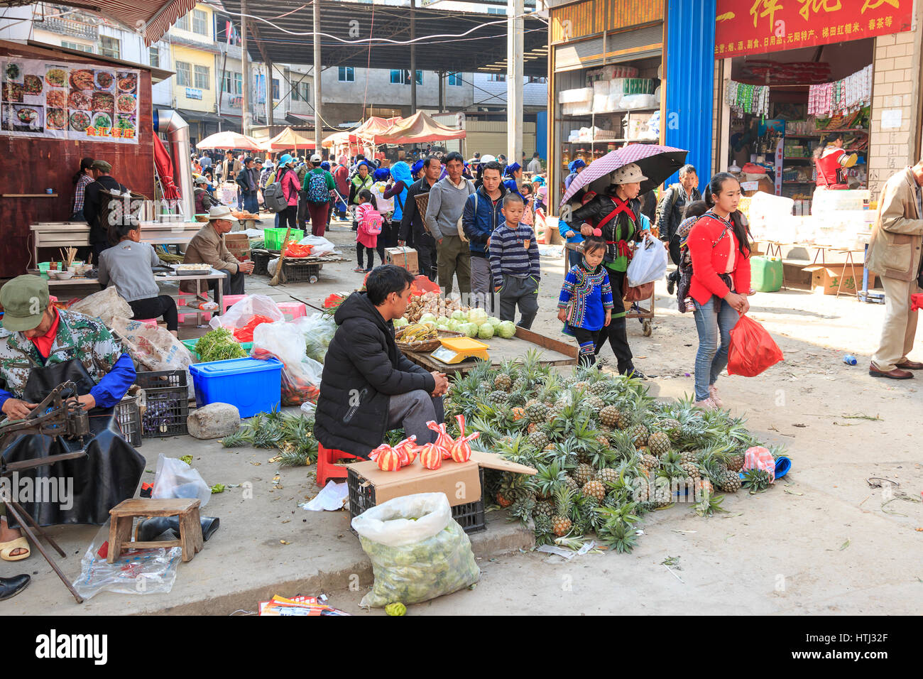 YuanYang, China - February 21, 2017: Hani people buying stuff in the ...