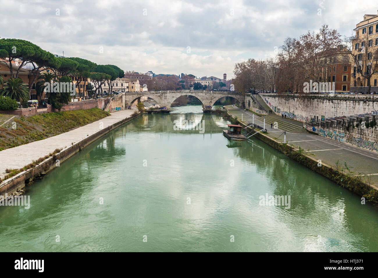 Bridge over the Tiber river passing through Rome, Italy Stock Photo - Alamy