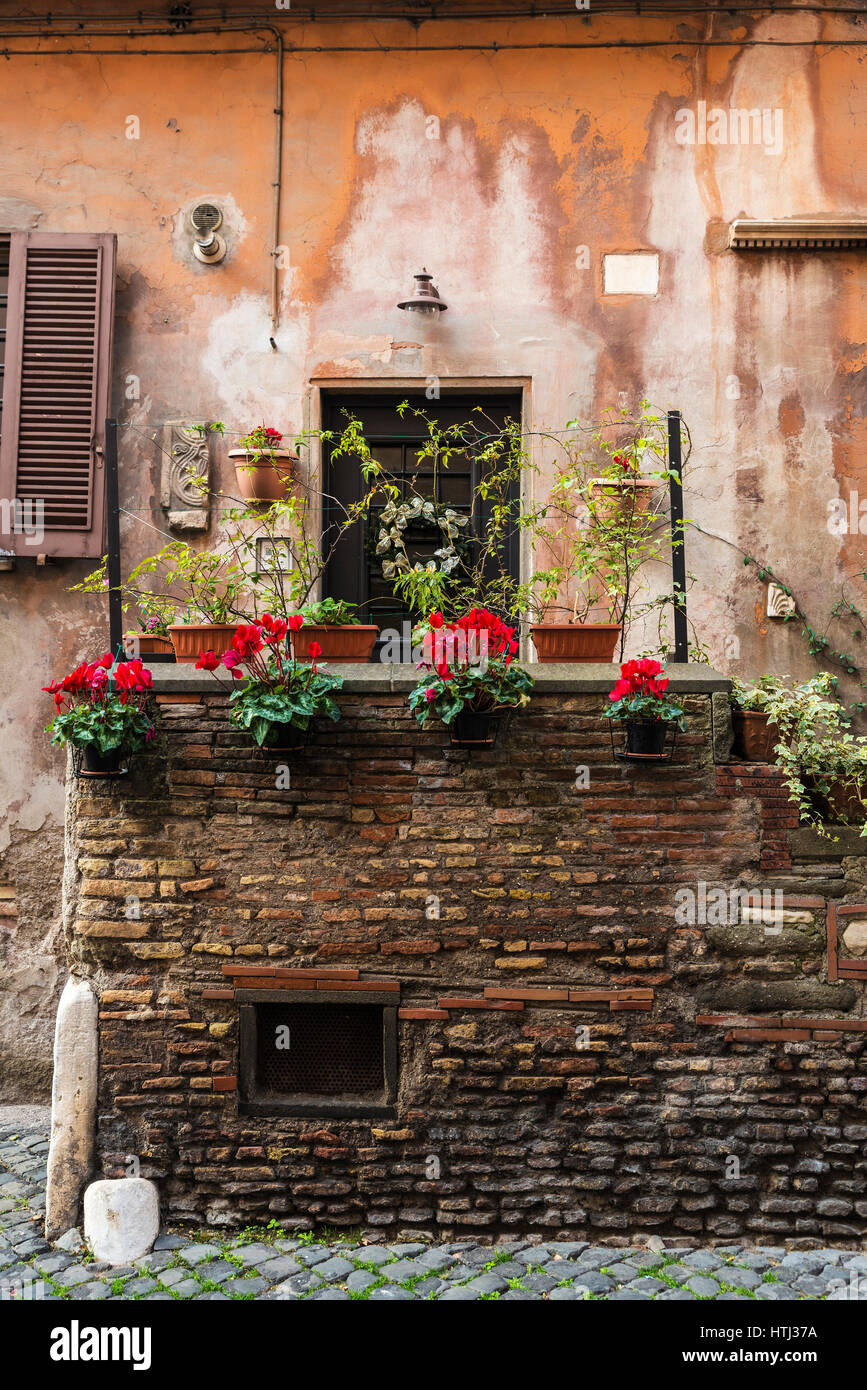 Facade of an old classic building in the historical center of Rome ...