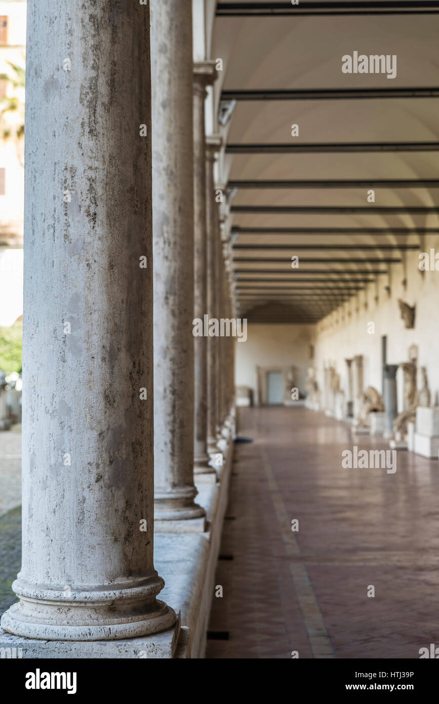 Corridor of roman columns as background in Rome, Italy Stock Photo - Alamy