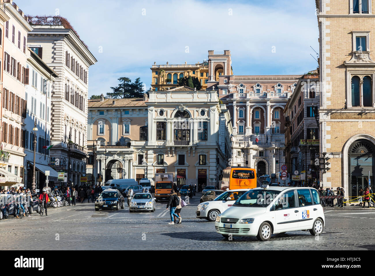 Rome, Italy - December 31, 2016: Traffic on a street and people walking ...