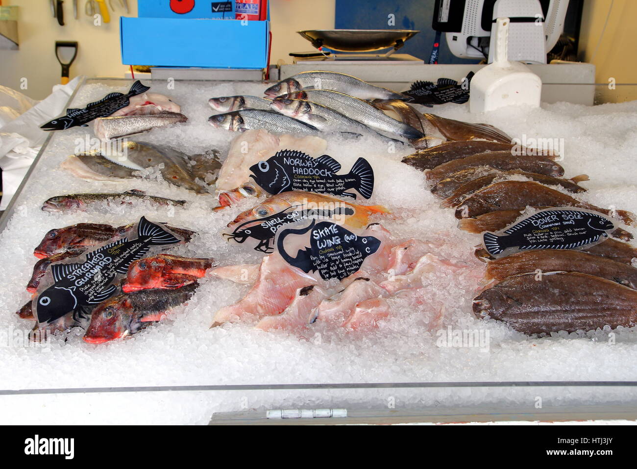 Littlehampton, UK - October 25 2016: Fresh fish on ice in a traditional ...